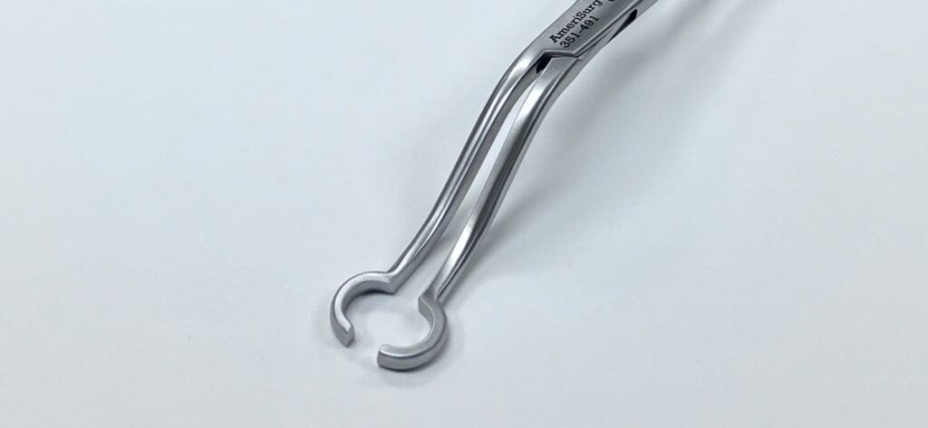 FEMORAL COMPONENT TRUNNION CLAMP - American Surgical Specialties Company